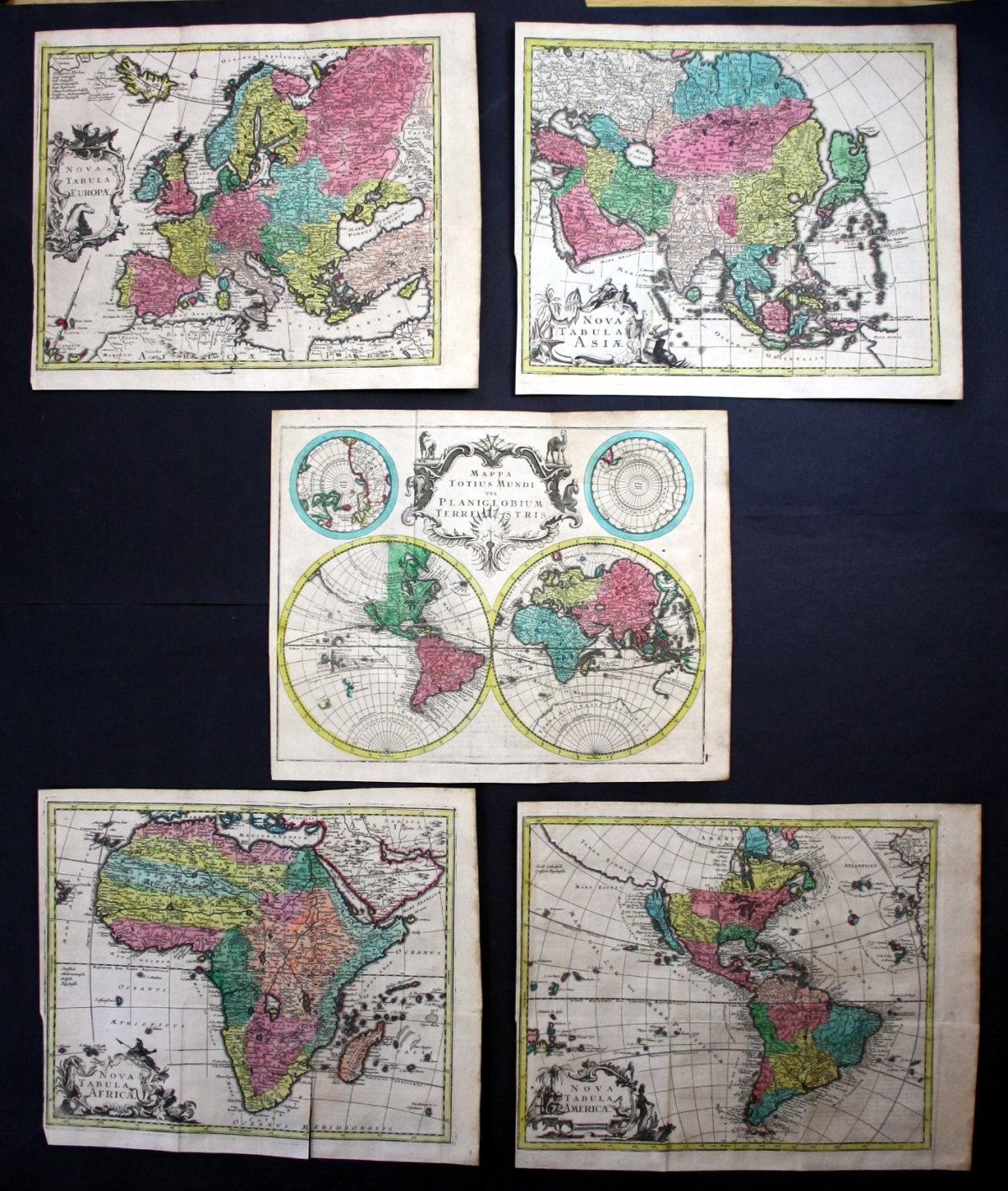 One world map and 4 maps of continents, handcolored and engraved by ...